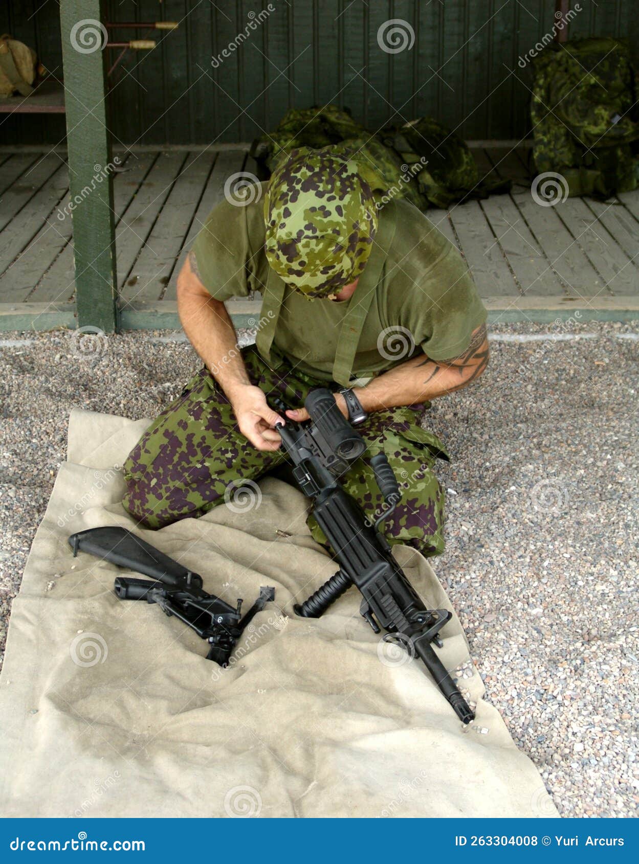 Assembling a Rifle in Haste. an Experienced Soldier Assembling His ...