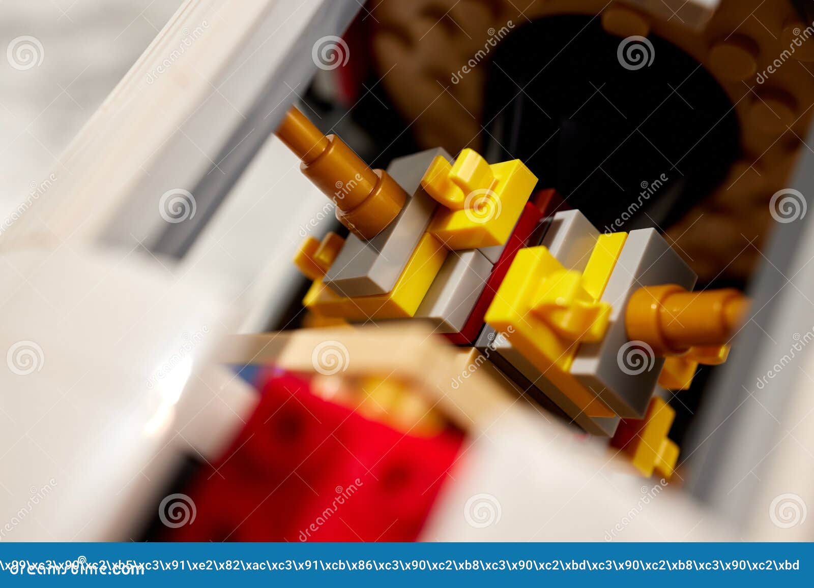 Assembling a Rocket Constructor. Colored Plastic Small Blocks. Stock ...
