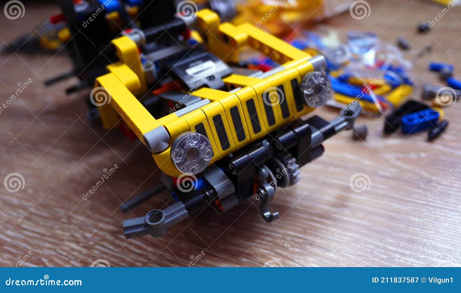 Assembling a Toy Constructor by a Child. Colorful Construction Kit for ...