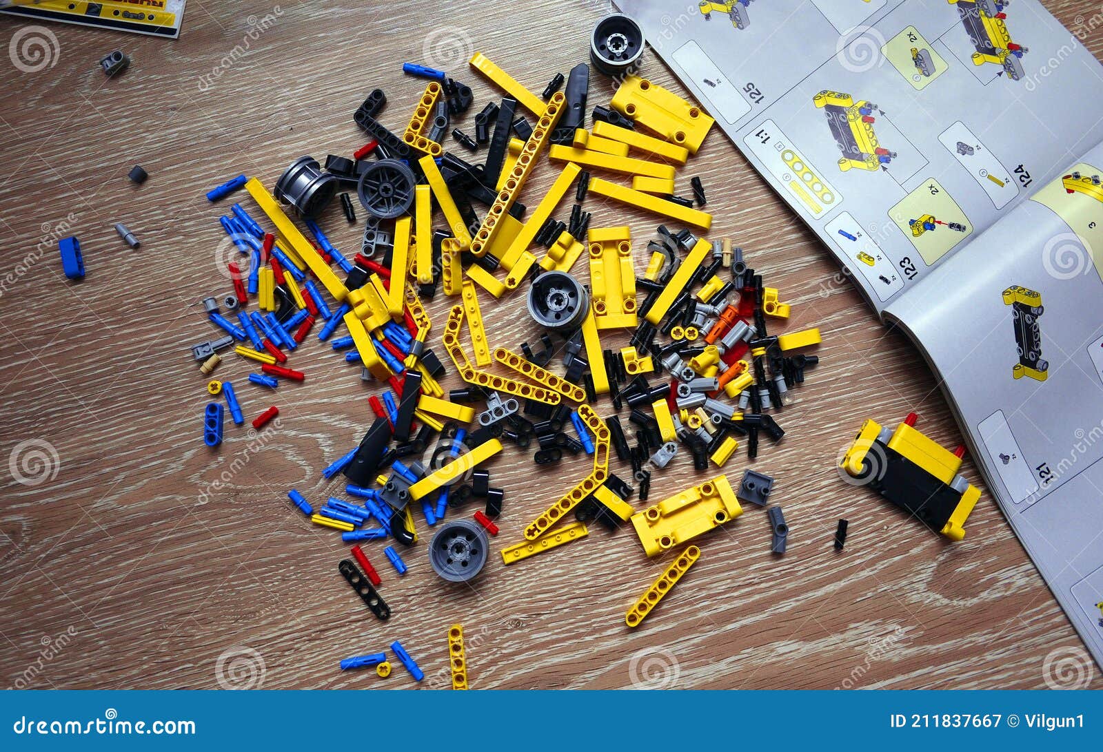 Assembling a Toy Constructor by a Child. Colorful Construction Kit for ...