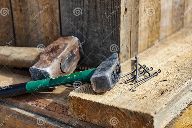 Assembling the Wooden Formwork of the Foundation. Sledgehammer, Hammer ...