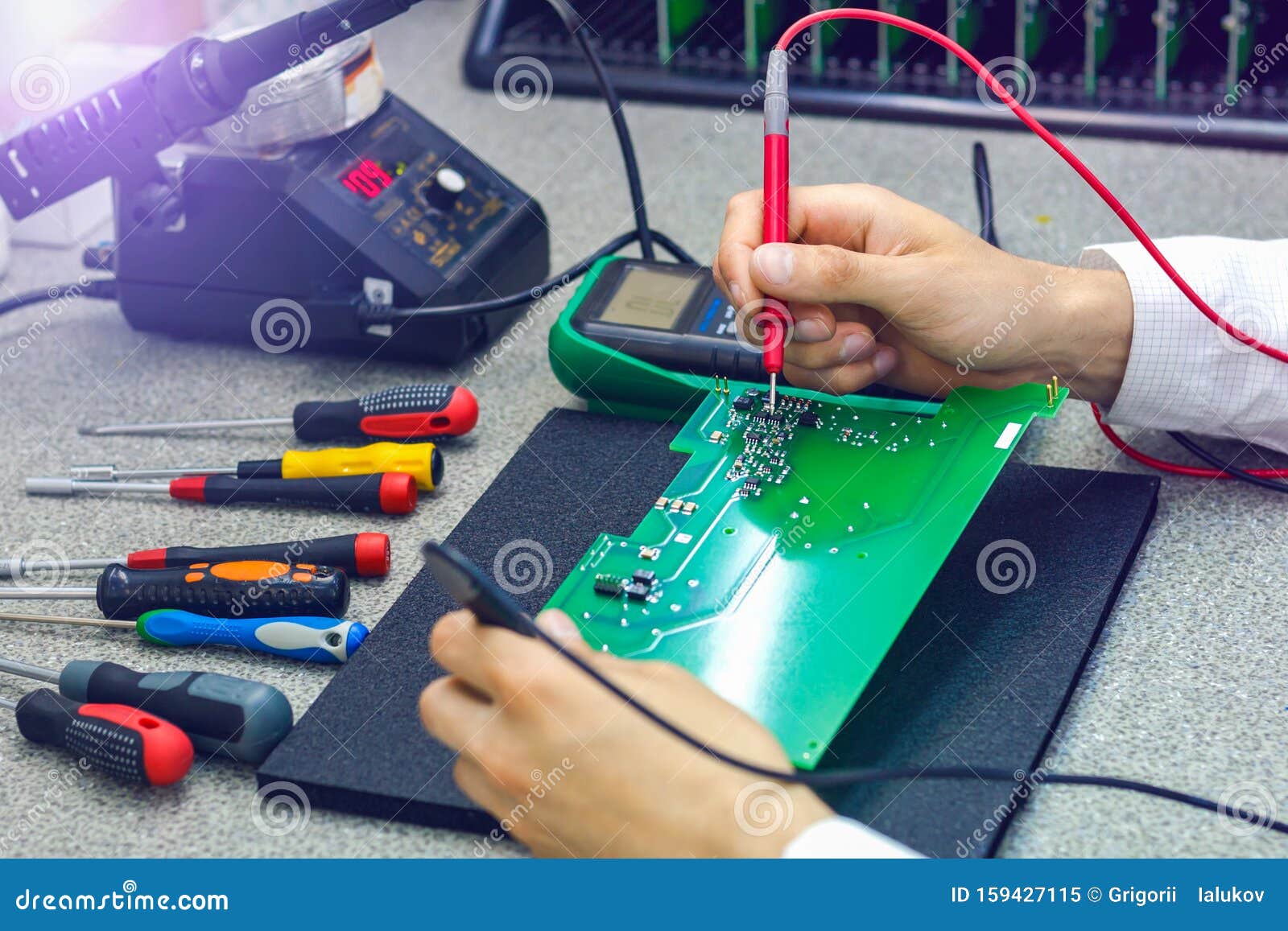 Checking the Electronic Device. Assembly of Electronic Boards Stock ...