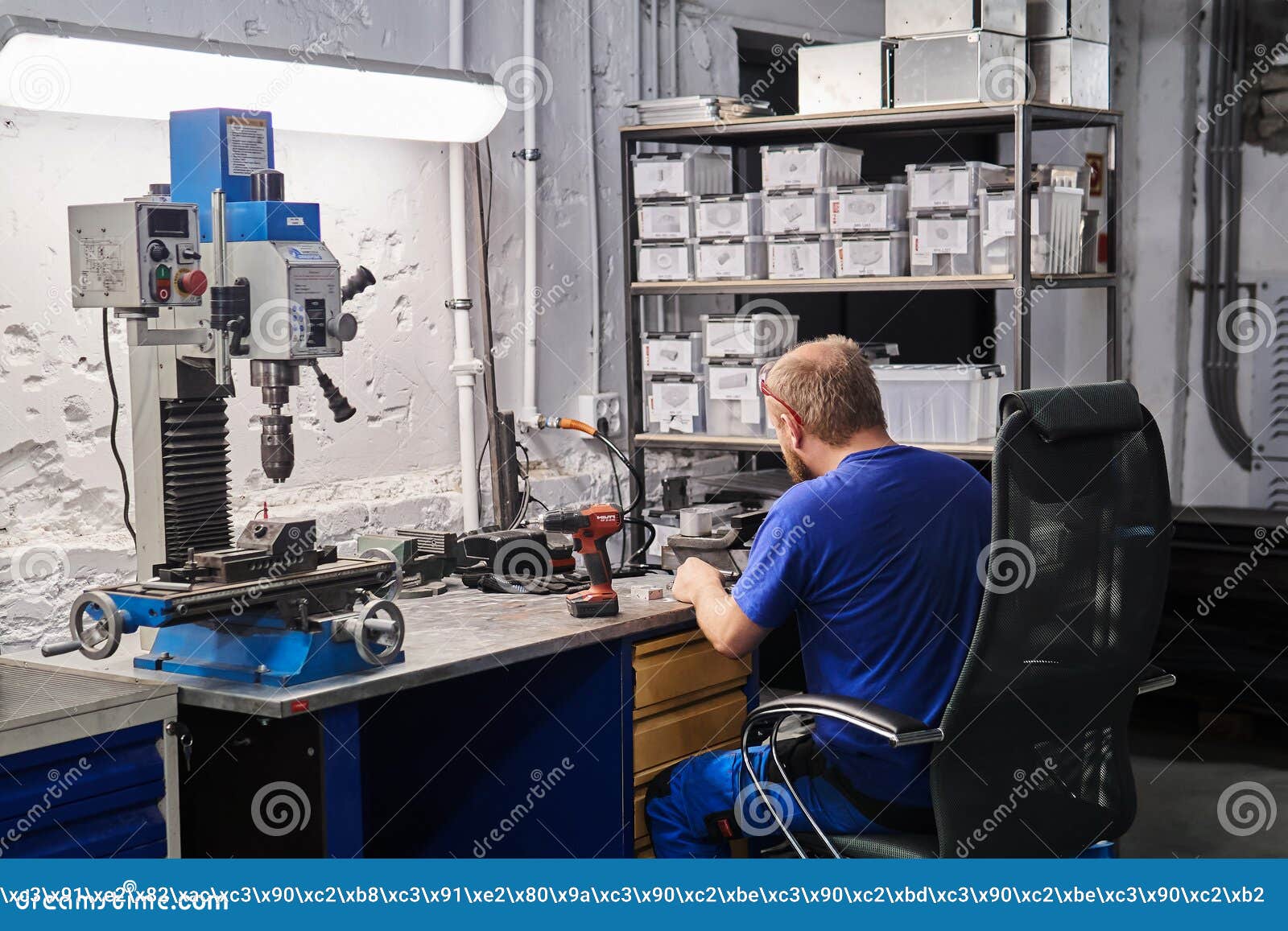 Assembly Engineer Working on Some Small Equipment at His Desk Editorial ...
