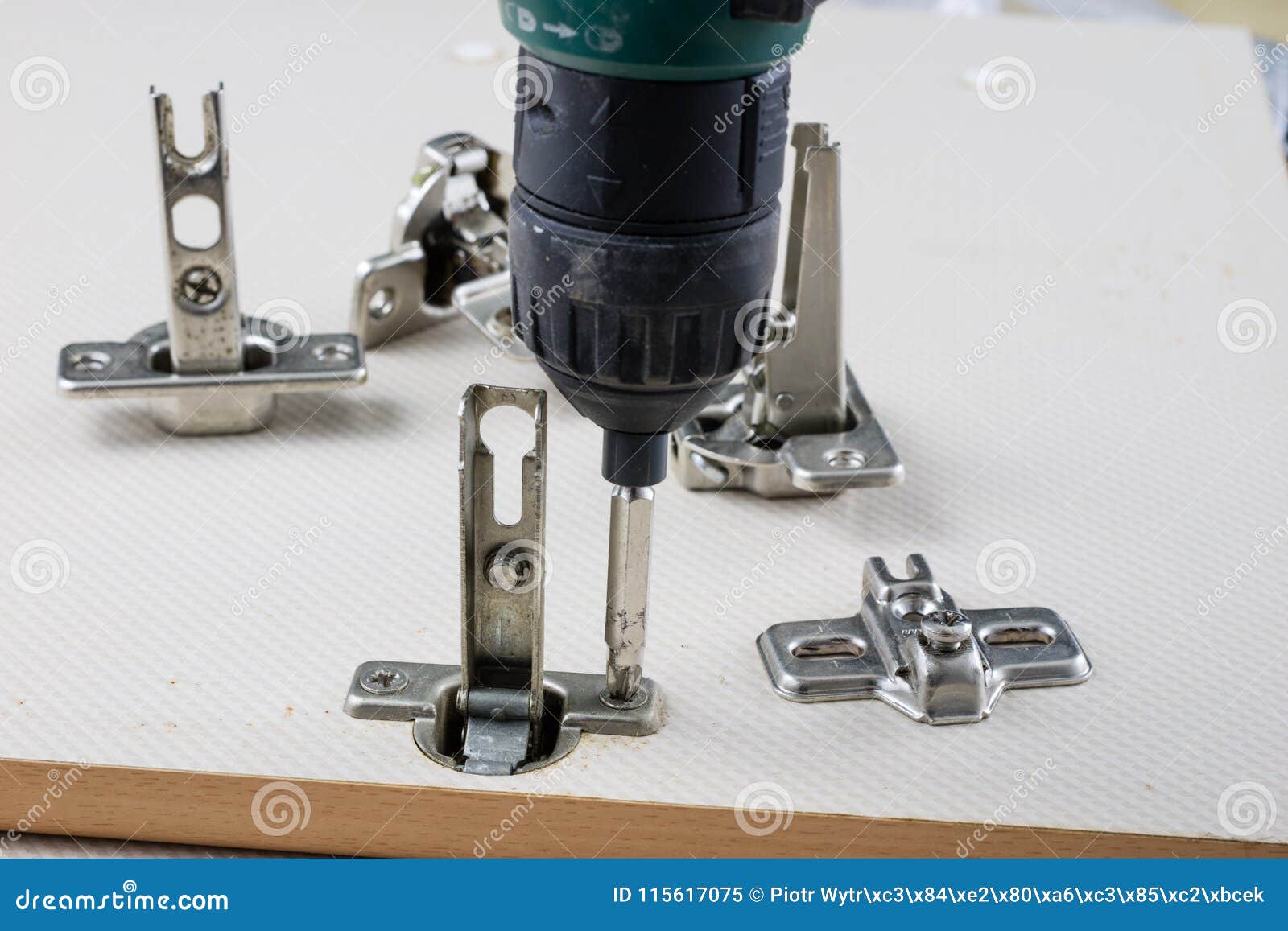 Assembly of Hinges in a Carpentry Workshop. Joinery Accessories Stock ...