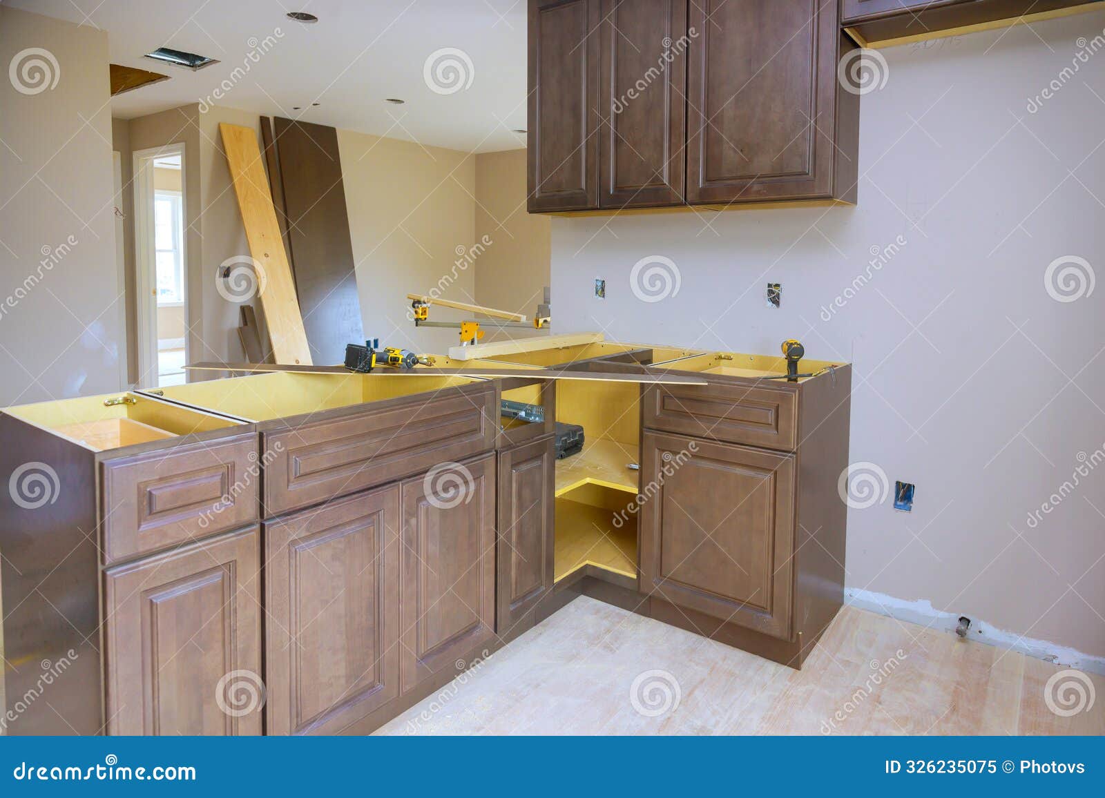 Assembly of New Custom Kitchen Cabinets during Construction a Home ...