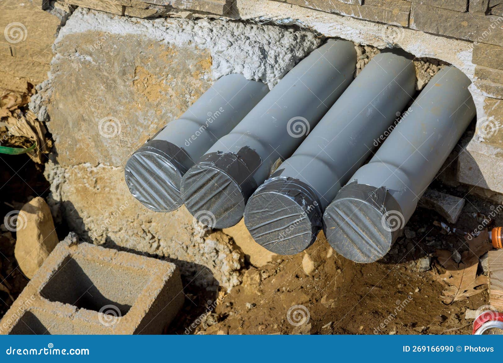 During the Assembly Process, a New Plastic Sewer Pipe is Being ...