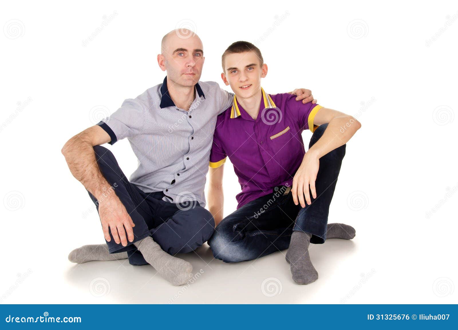 Assento Do Pai E Do Filho Adolescente Foto De Stock Imagem De Cara