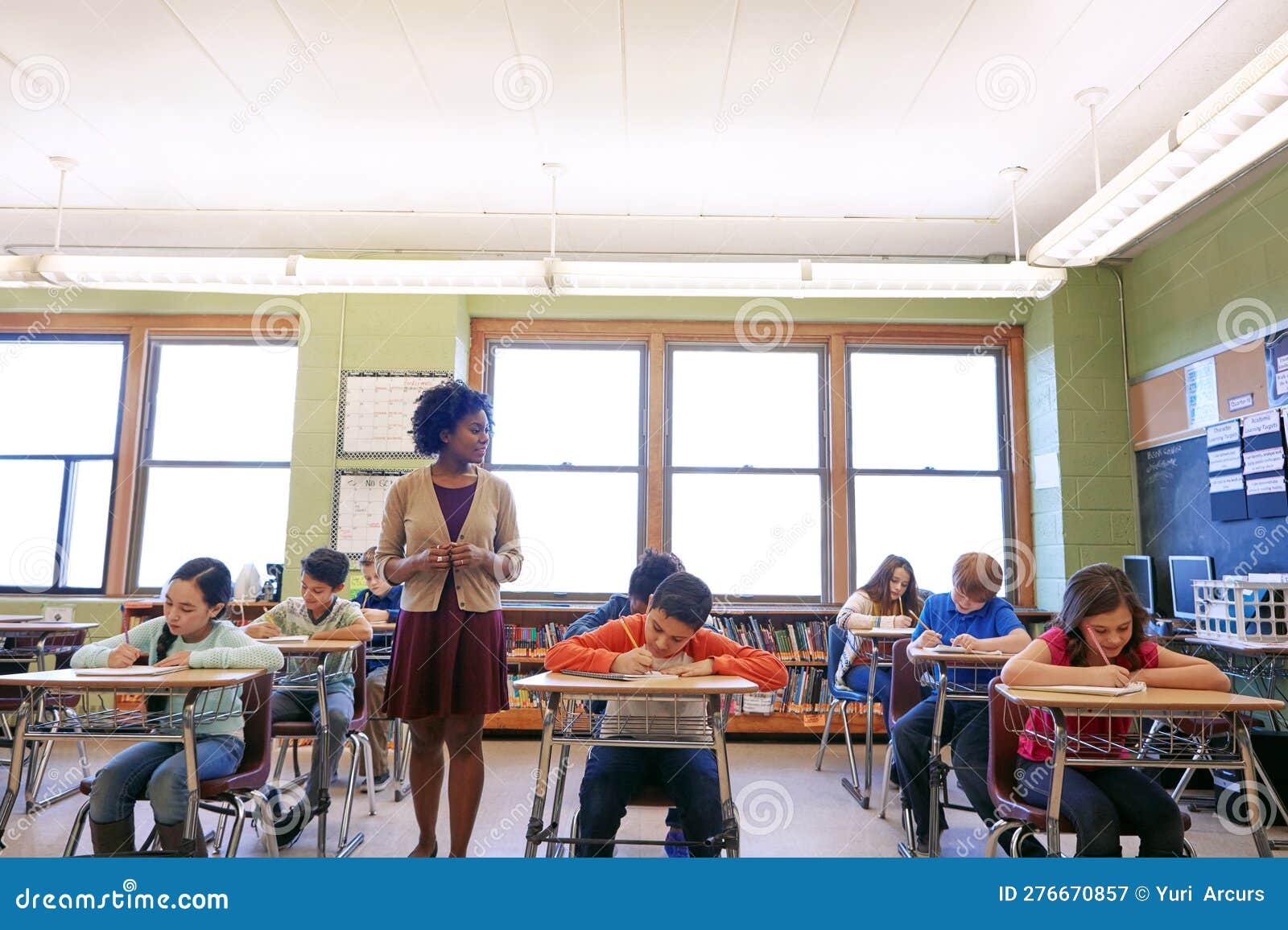 Assessment is a Critical Piece of the Learning Process. a Teacher in a ...