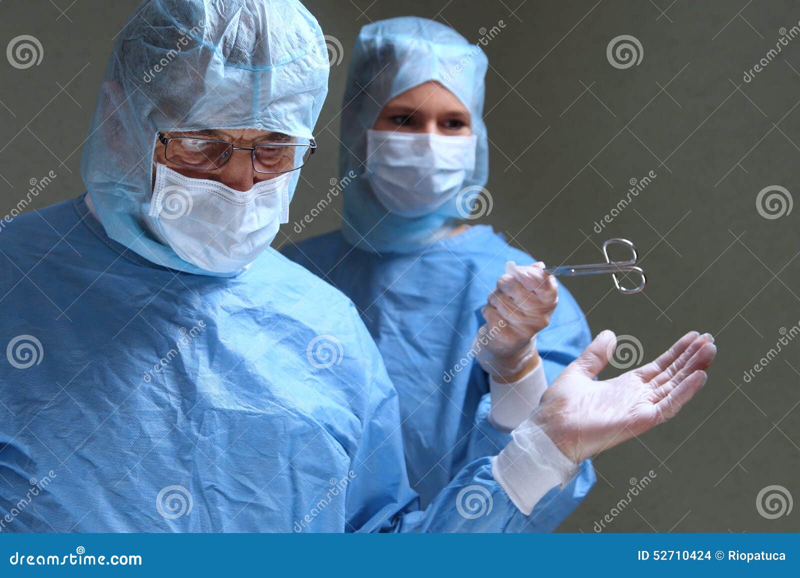 Assistang Gives Doctor Scissors in a Op Stock Photo - Image of hygiene ...