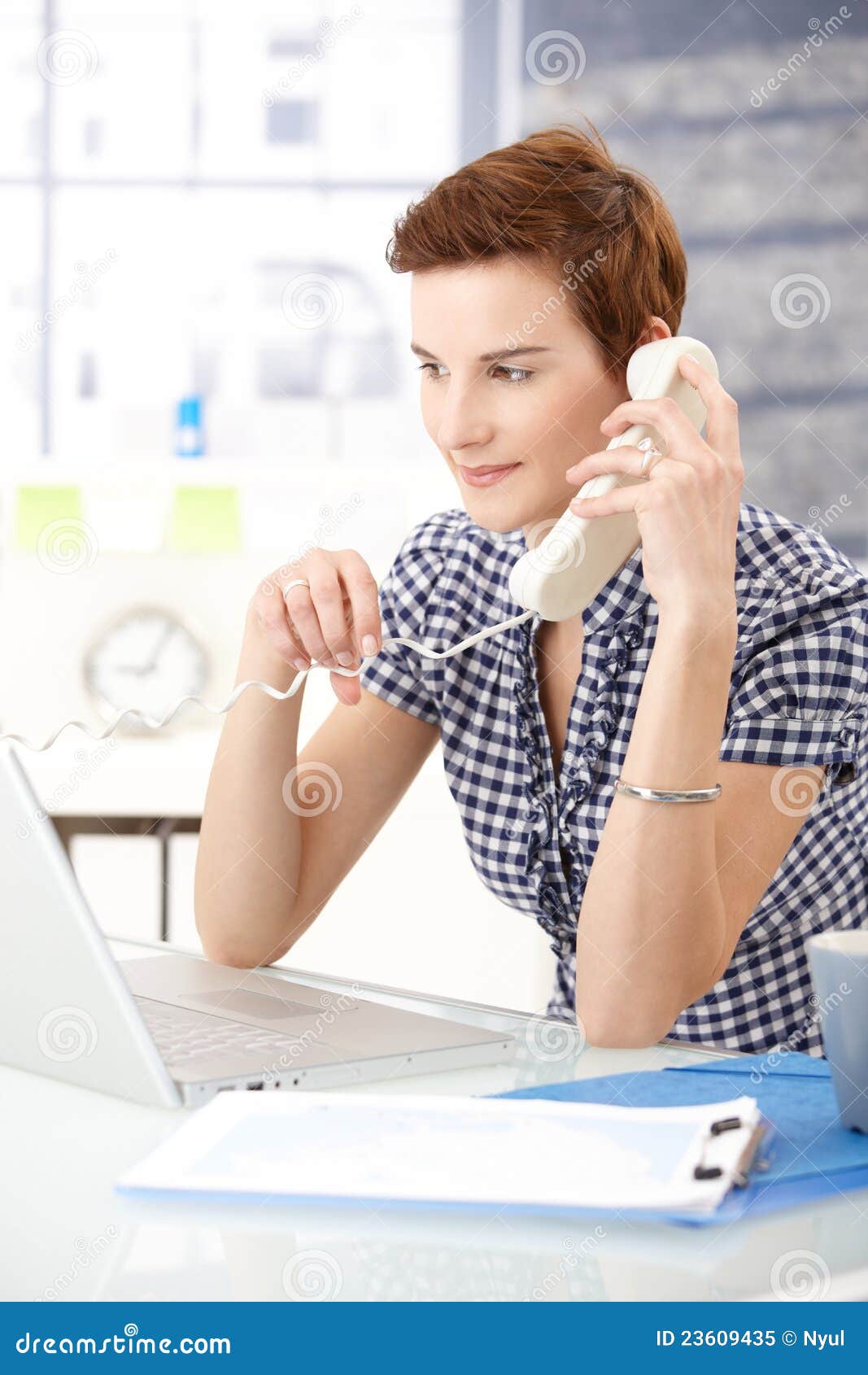 Assistant answering phone stock image. Image of computer - 23609435