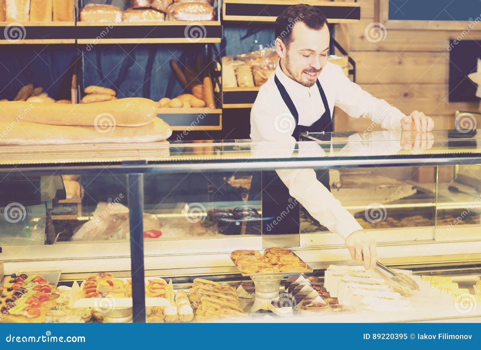Assistant Baker Showing Cakes Stock Image - Image of baked, flavored ...