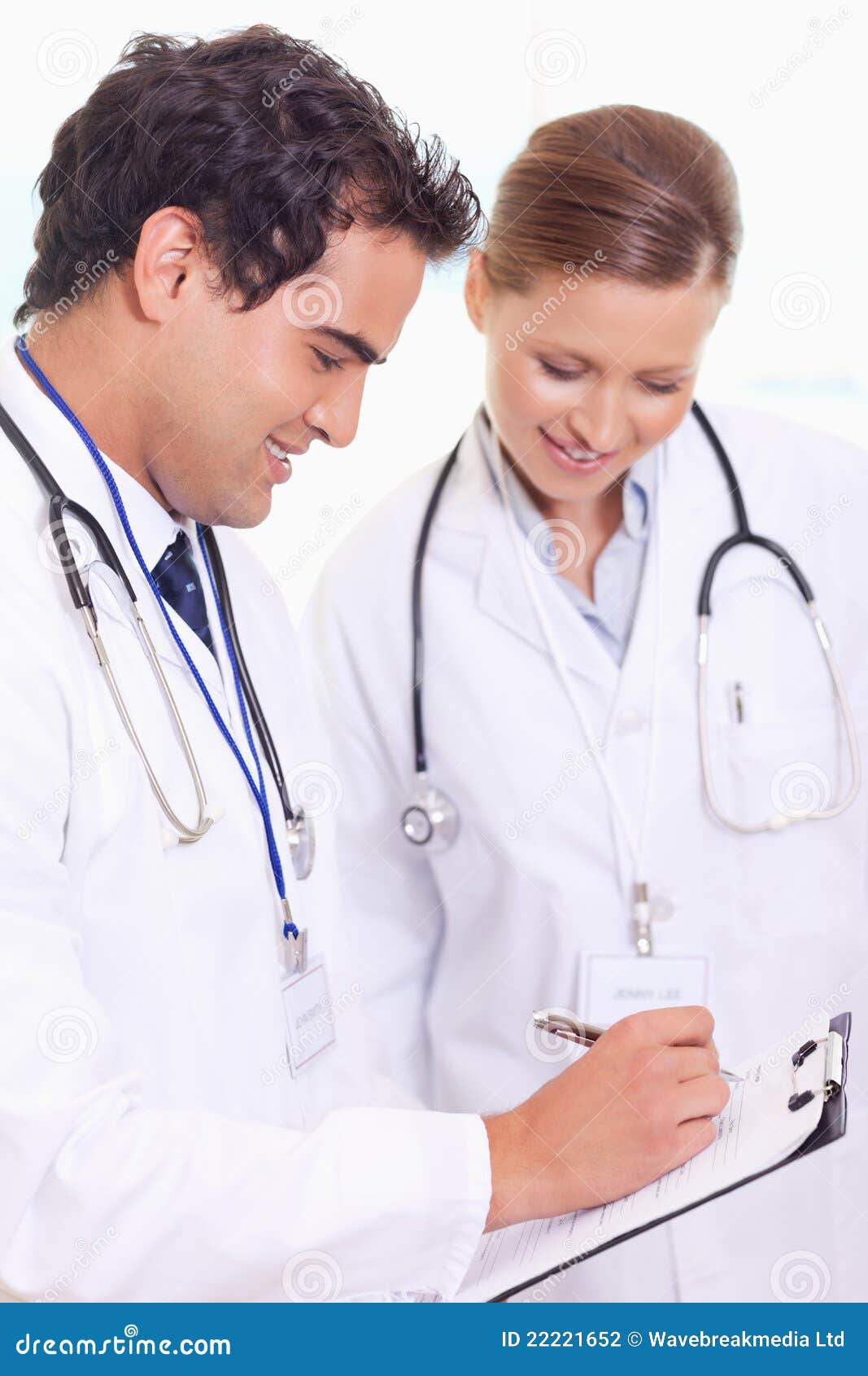 Assistant Doctors Taking Notes Stock Photo - Image of record, confident ...