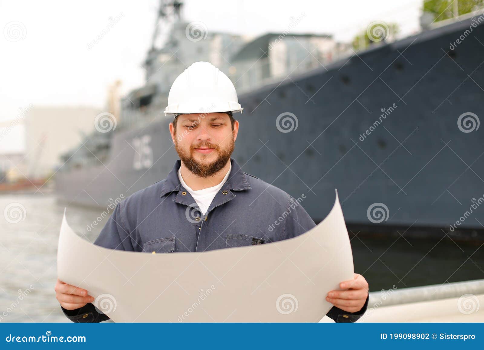 Assistant Engineer Reading Documents and Standing Near Vessel. Stock ...