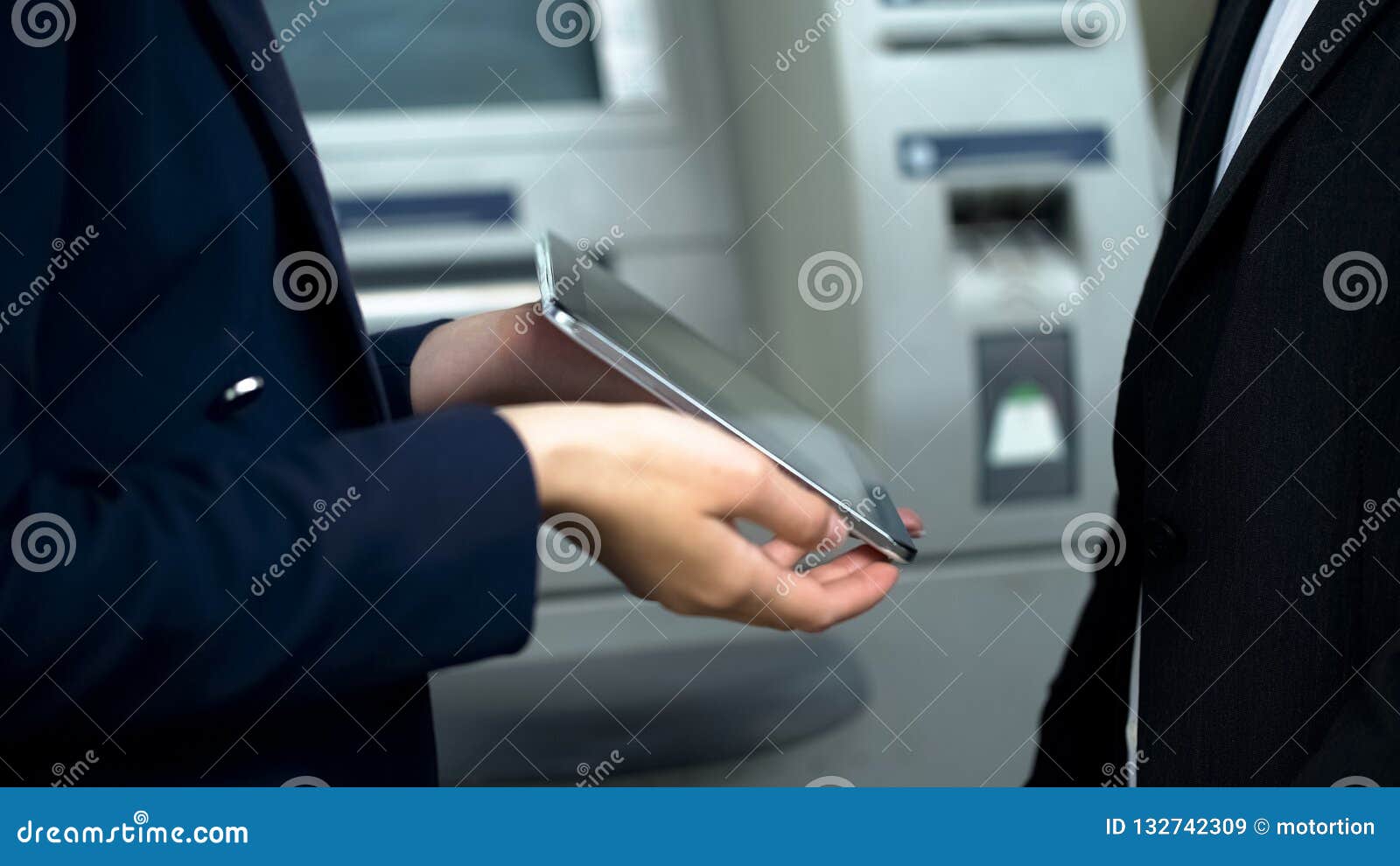 Assistant Helping Client with Online Banking Application on Tablet ...