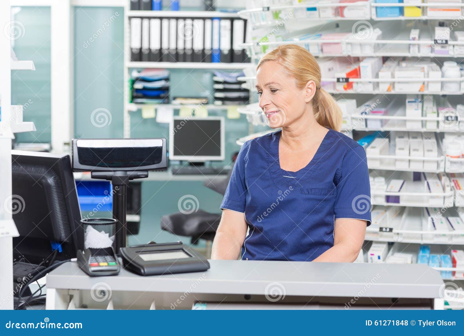 Assistant Looking at Computer while Sitting at Stock Photo - Image of ...
