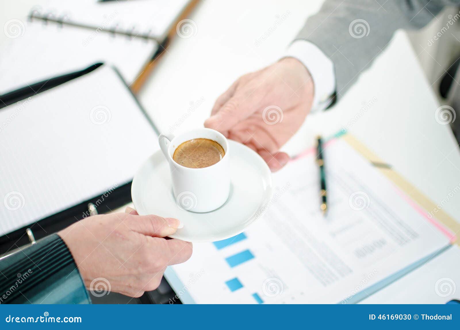Assistant Offering Coffee To Her Boss Stock Photo - Image of work ...