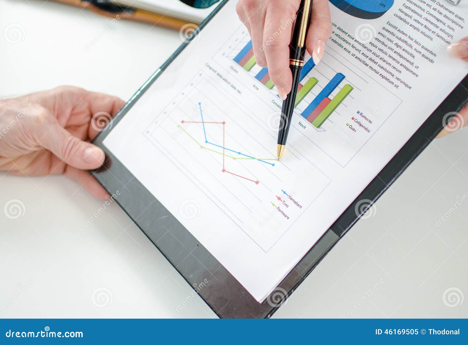 Assistant Showing Graphs To Her Boss Stock Image - Image of businessman ...