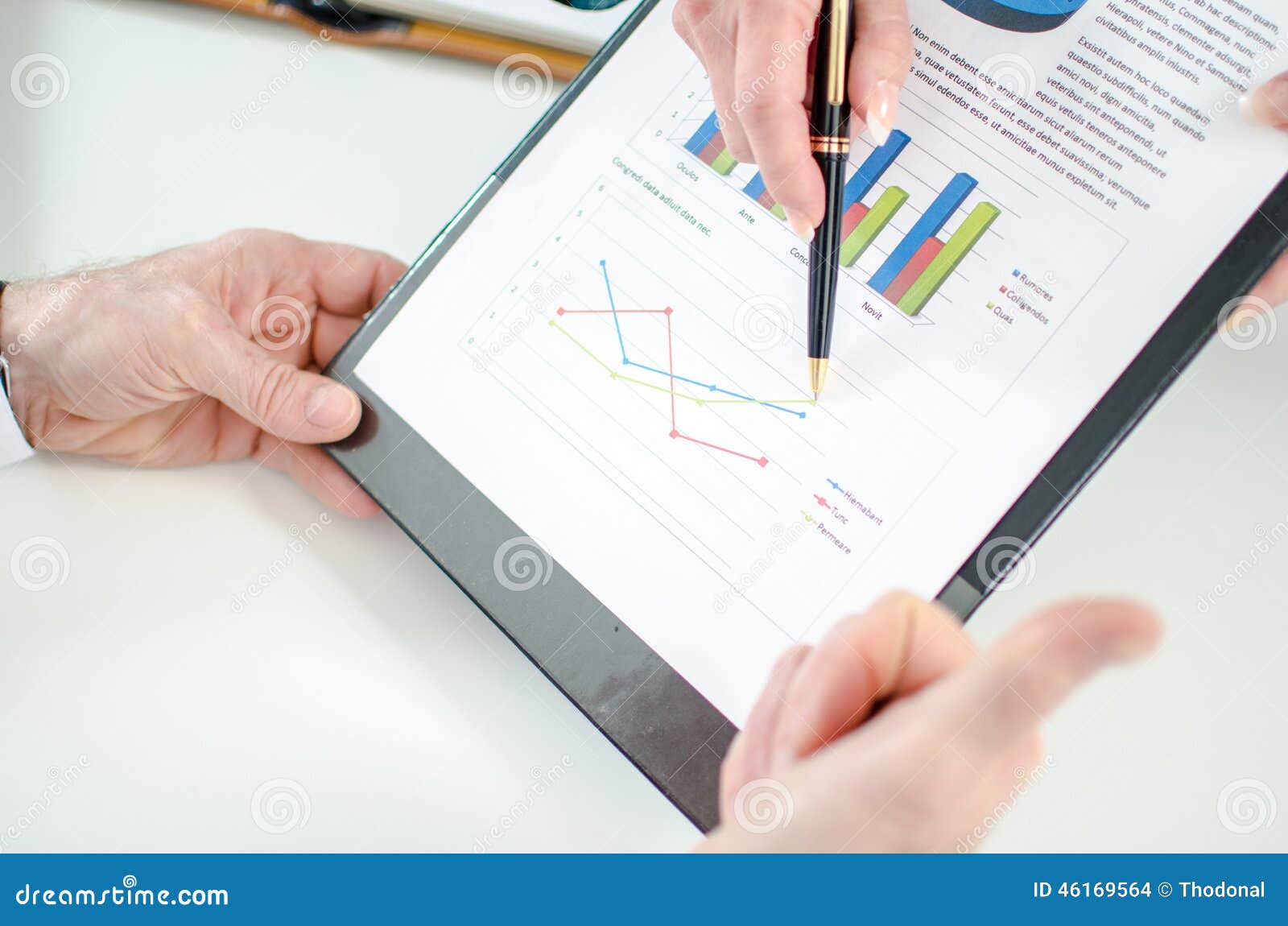 Assistant Showing Graphs To Her Boss Stock Photo - Image of showing ...