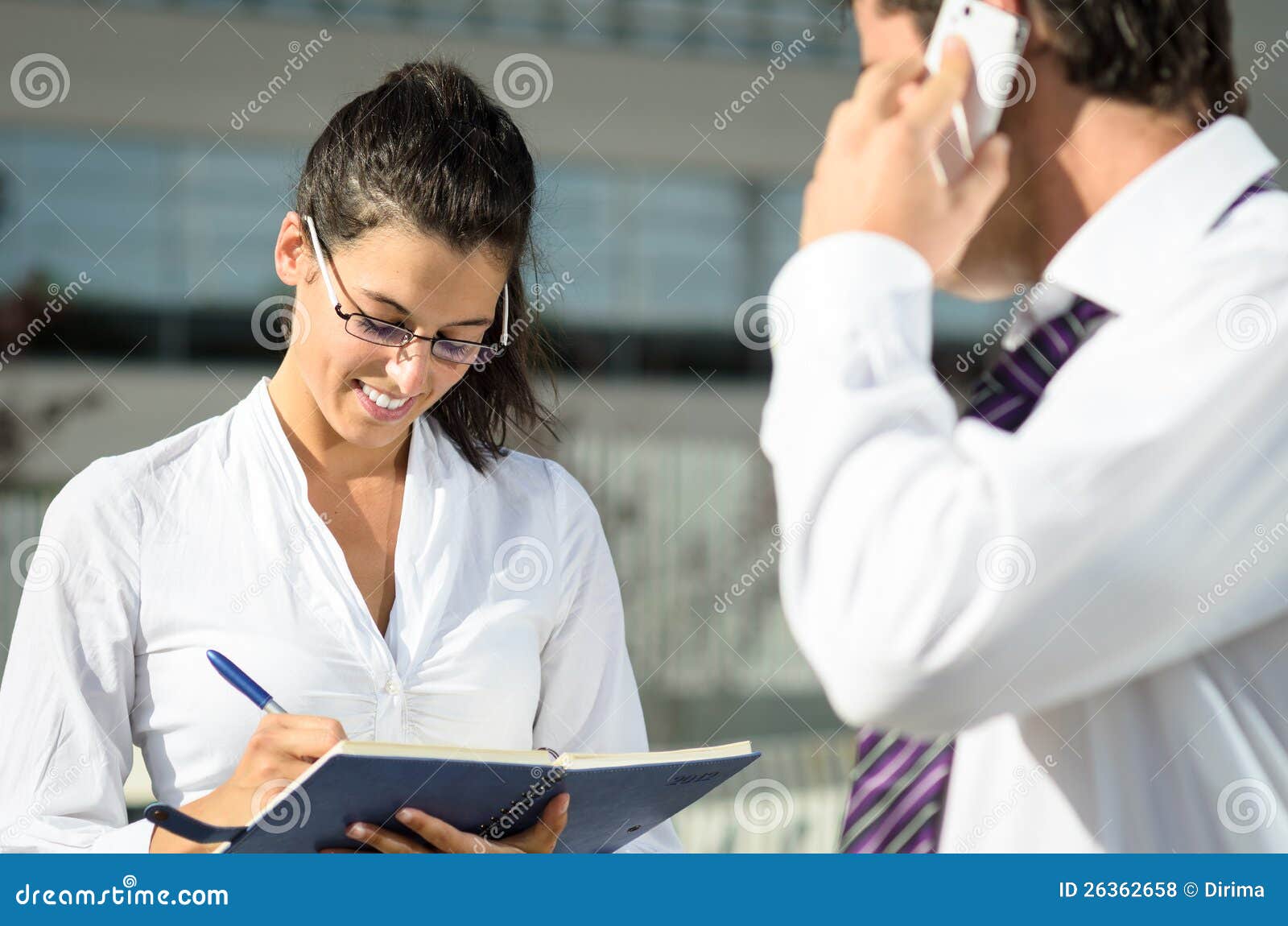 Assistant writing notes stock photo. Image of modern - 26362658