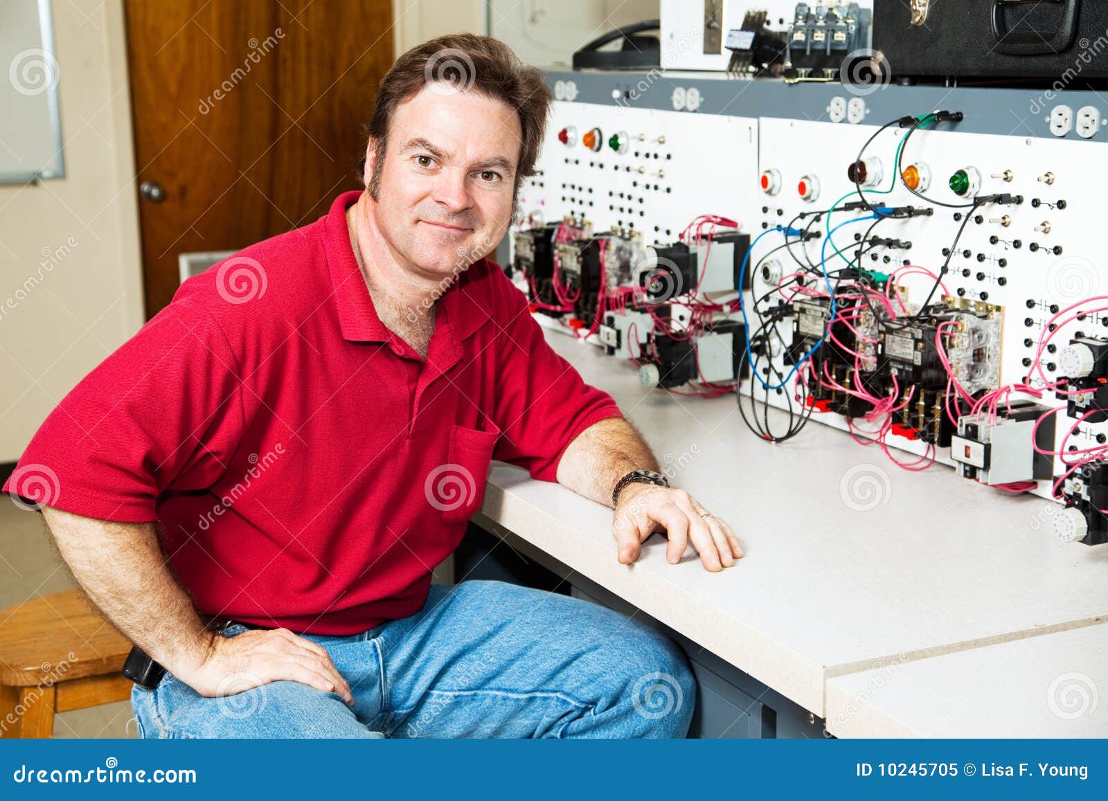 Assistente Tecnico Al Motore Control Center Immagine Stock - Immagine ...