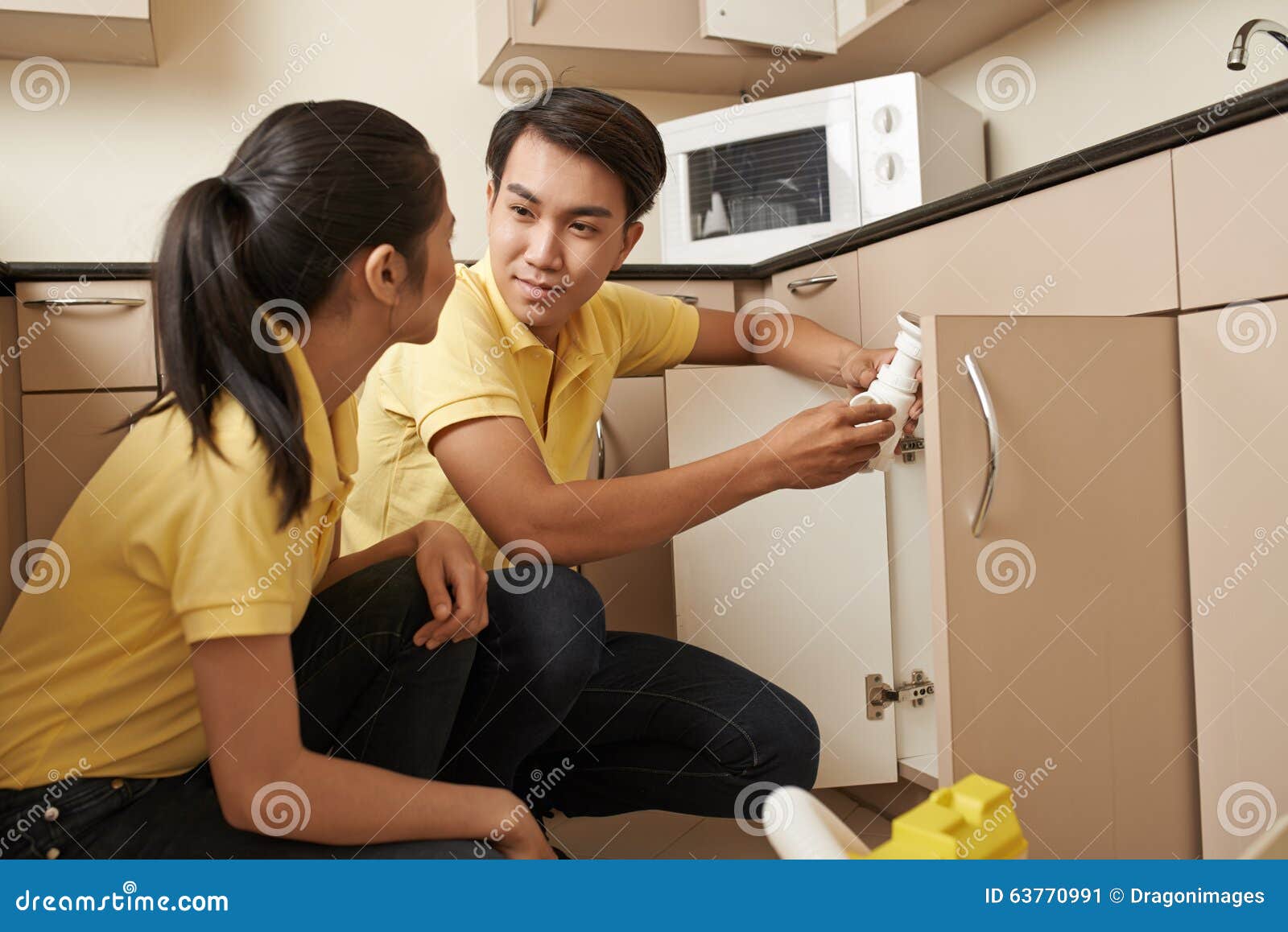 Assisting plumber stock image. Image of fixing, detail - 63770991