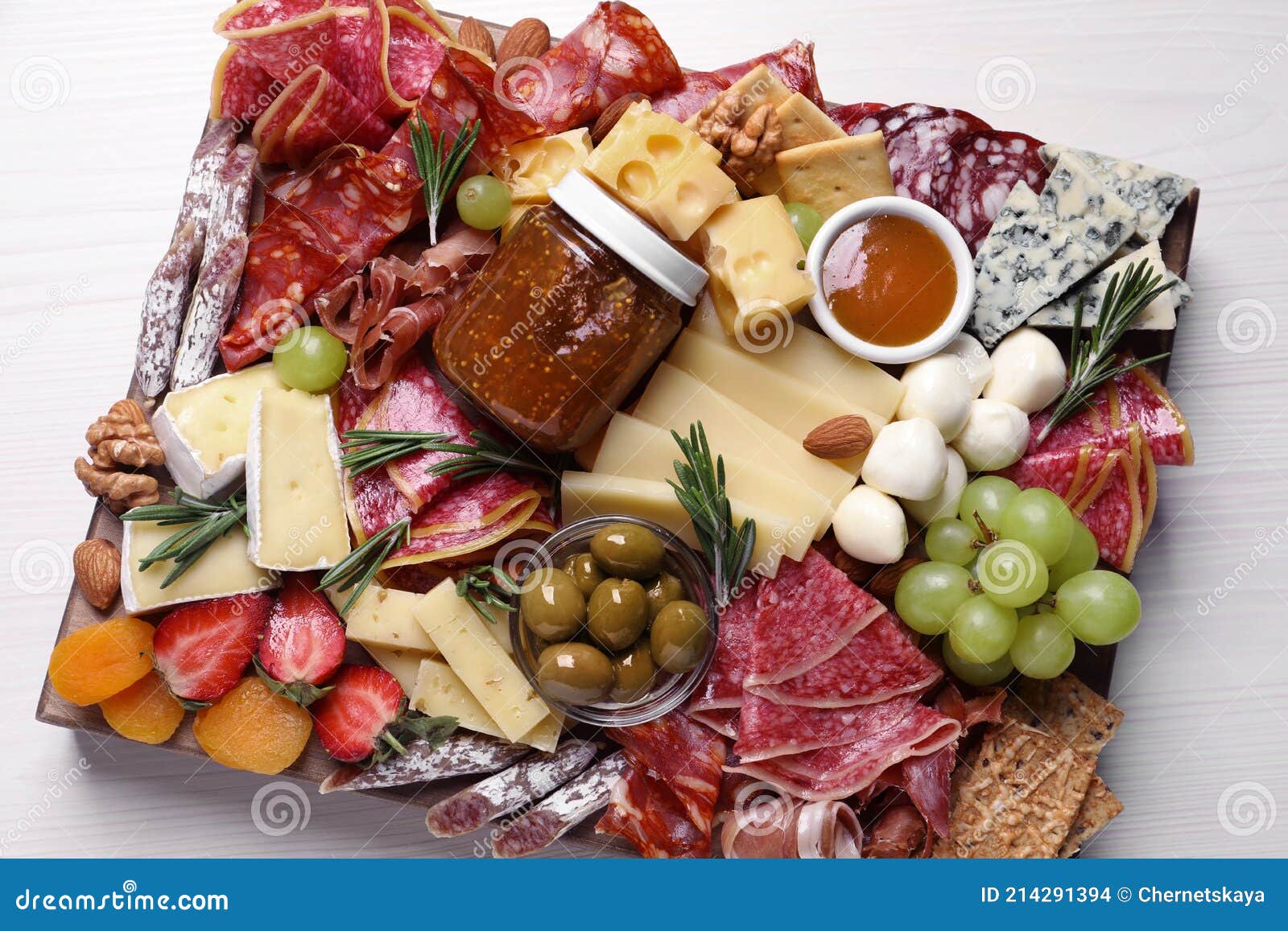 Assorted Appetizers Served on White Wooden Table, Top View Stock Photo ...