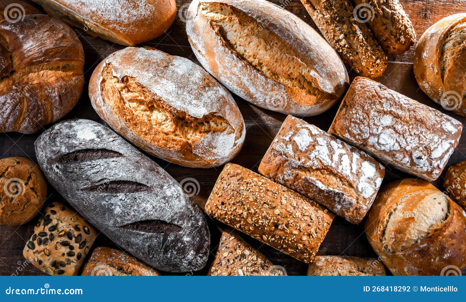 Assorted Bakery Products Including Loafs of Bread and Rolls Stock Photo ...