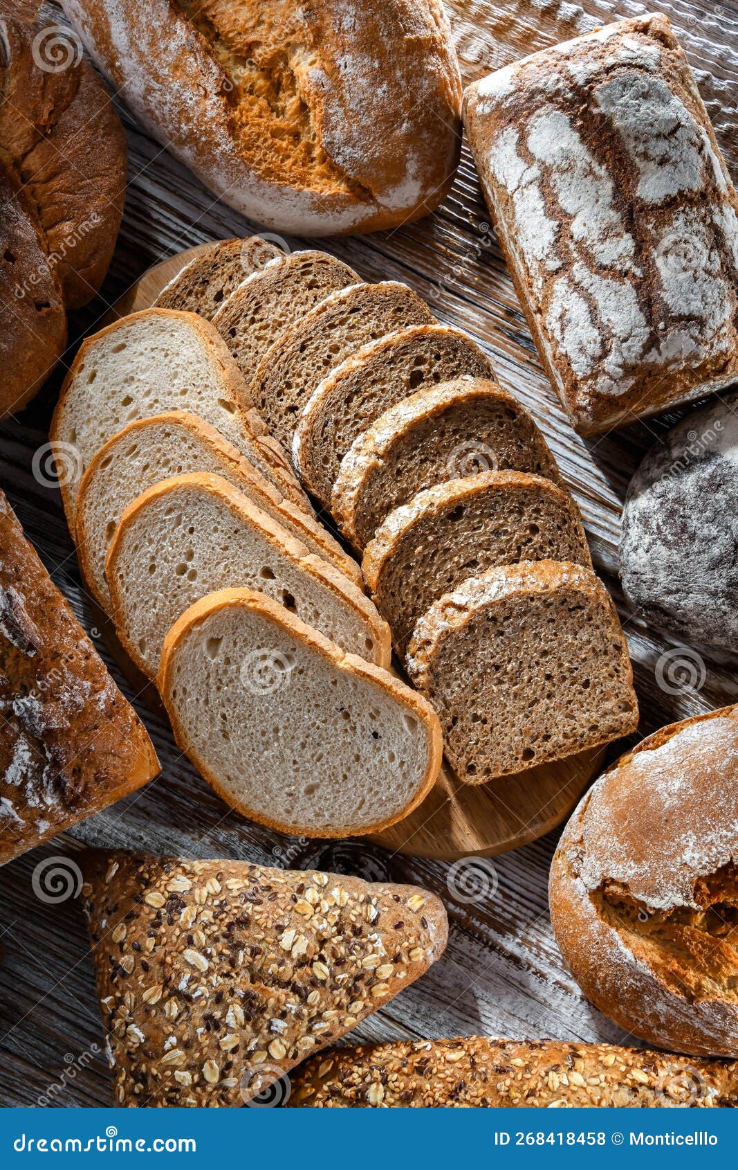 Assorted Bakery Products Including Loafs of Bread and Rolls Stock Photo ...
