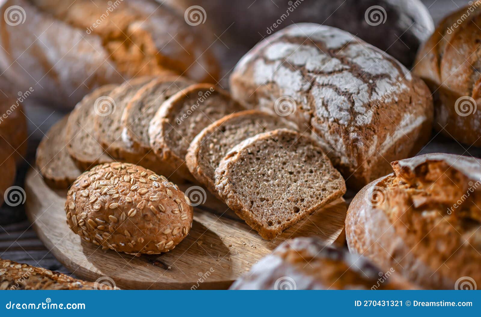 Assorted Bakery Products Including Loaves of Bread and Rolls Stock ...