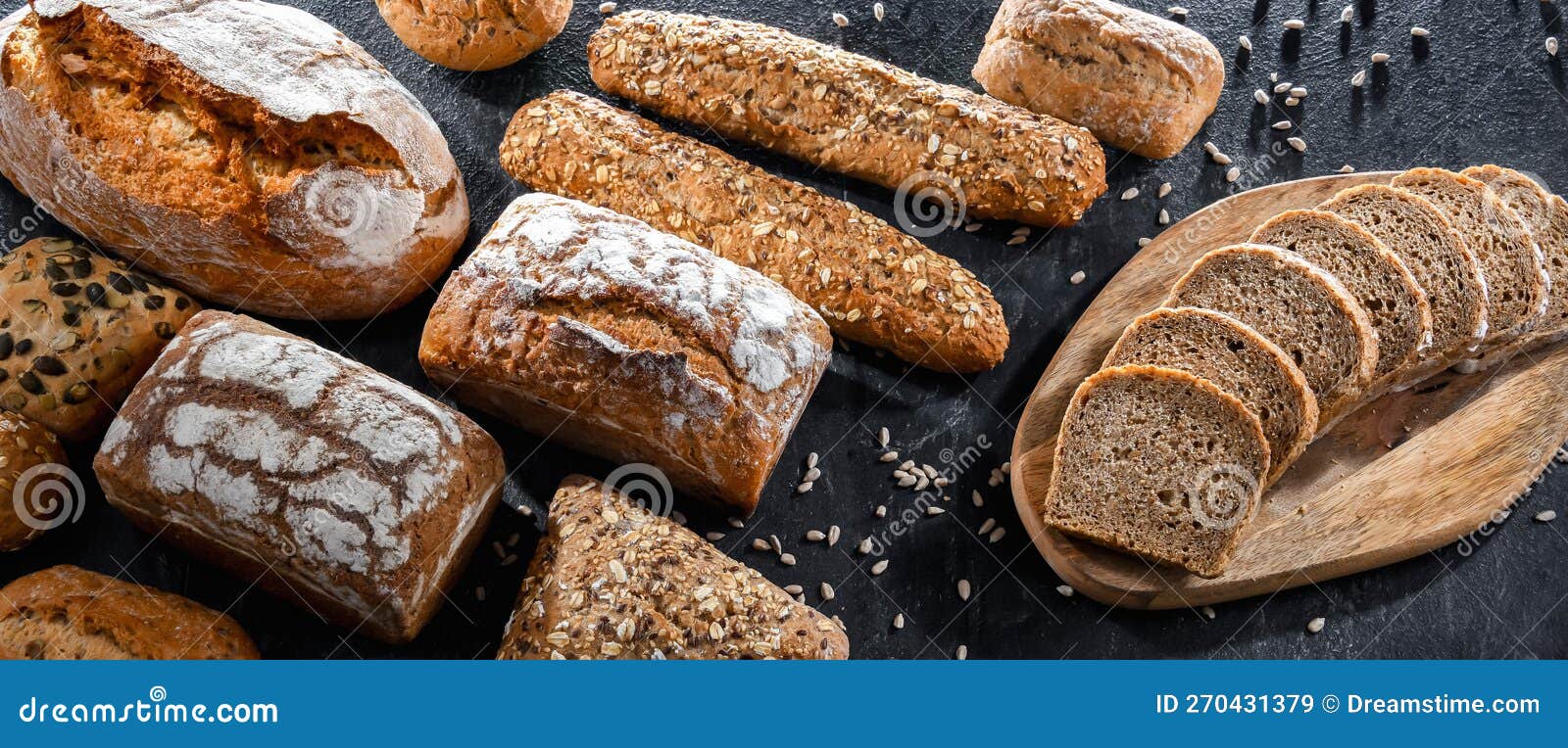 Assorted Bakery Products Including Loaves of Bread and Rolls Stock ...
