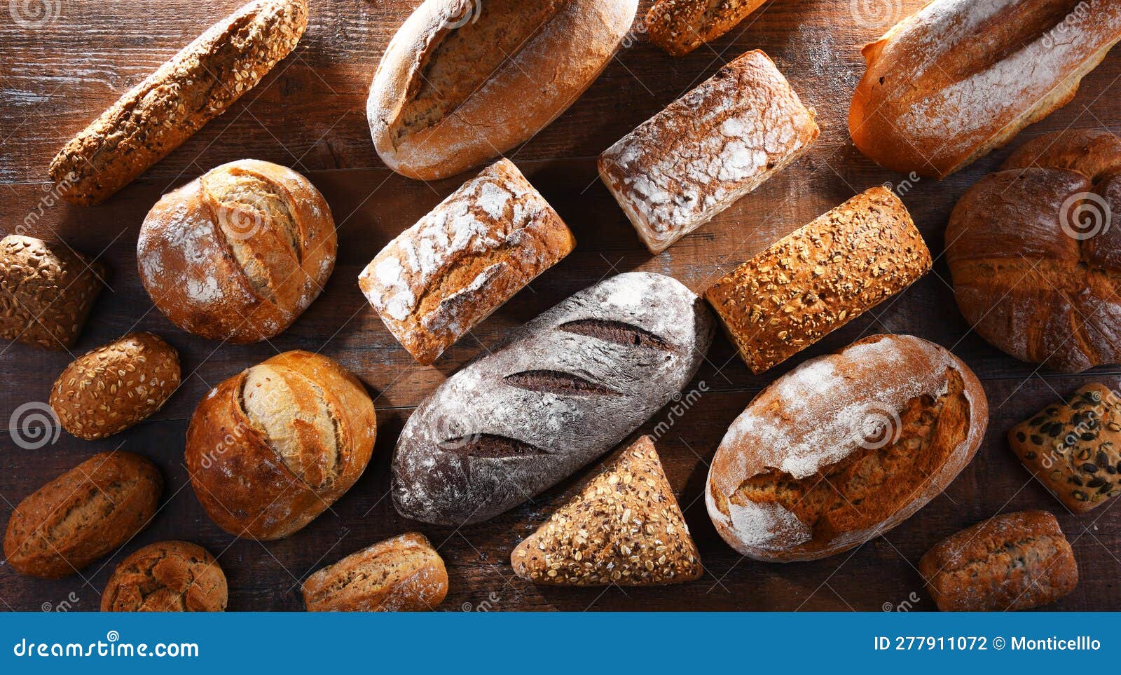 Assorted Bakery Products Including Loaves of Bread and Rolls Stock ...