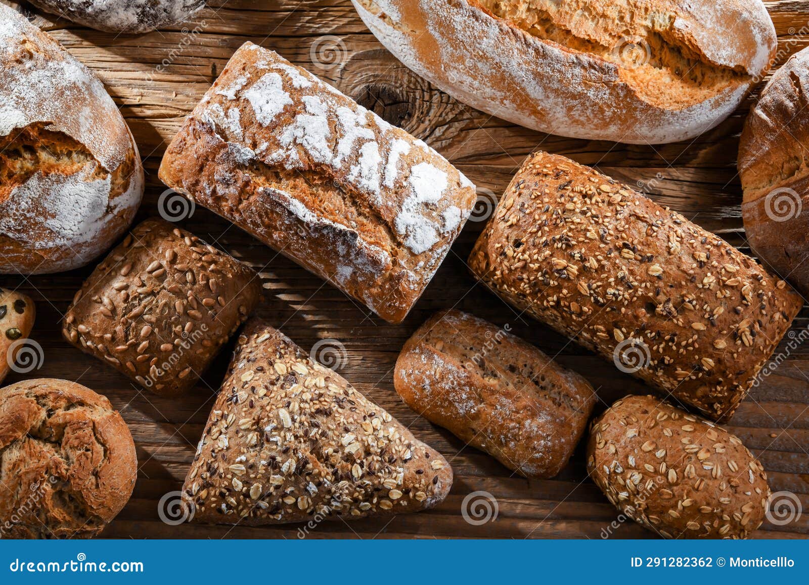 Assorted Bakery Products Including Loaves of Bread and Rolls Stock ...