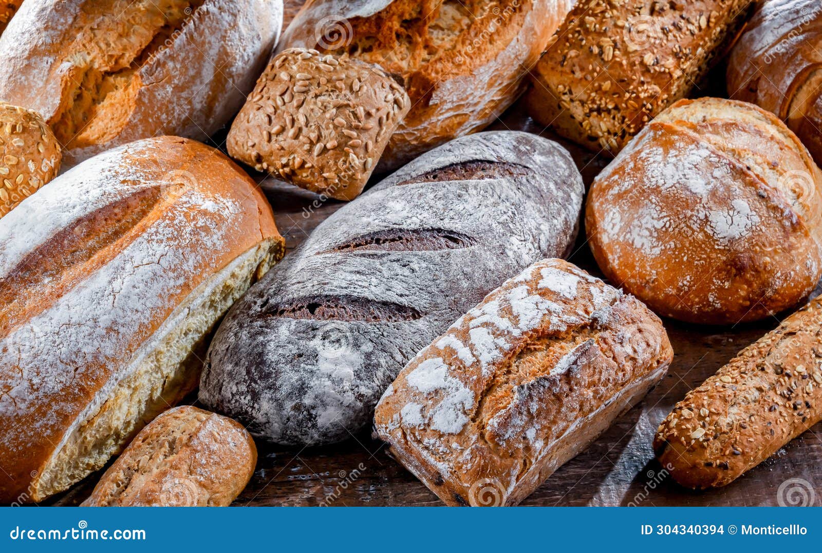 Assorted Bakery Products Including Loaves of Bread and Rolls Stock ...