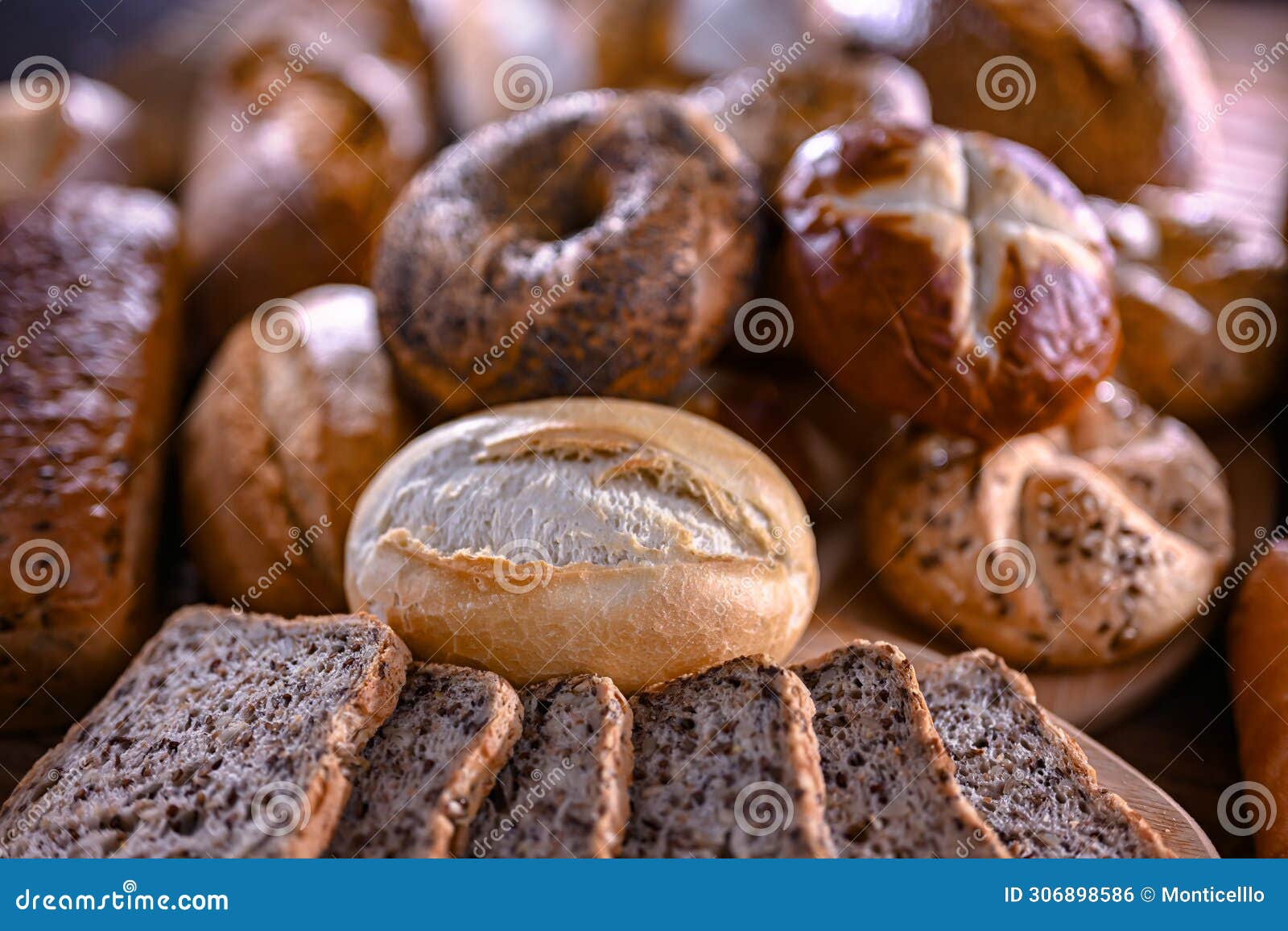 Assorted Bakery Products Including Loaves of Bread and Rolls Stock ...