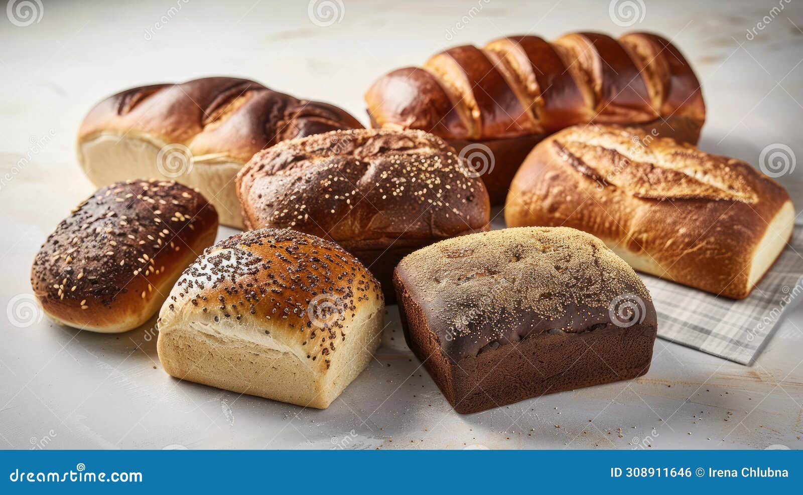 Assorted Bakery Products Including Loaves of Bread and Rolls Stock ...