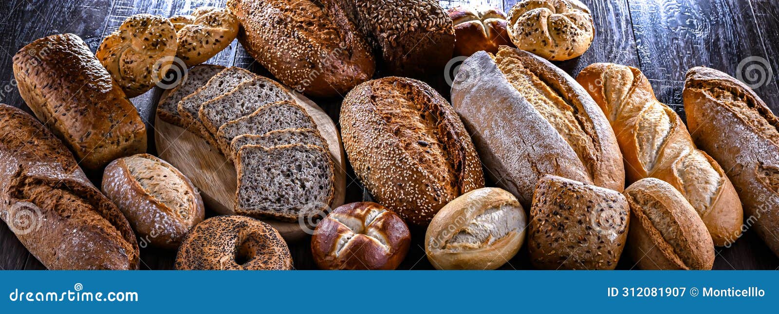 Assorted Bakery Products Including Loaves of Bread and Rolls Stock ...