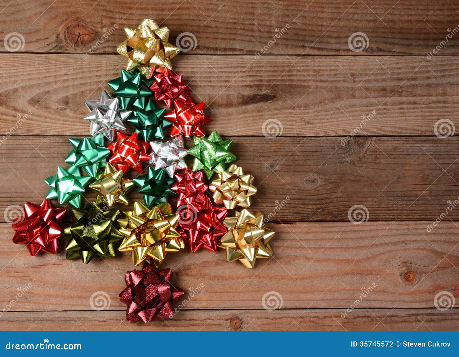 Assorted Bows in Christmas Tree Shape Stock Photo - Image of silver ...