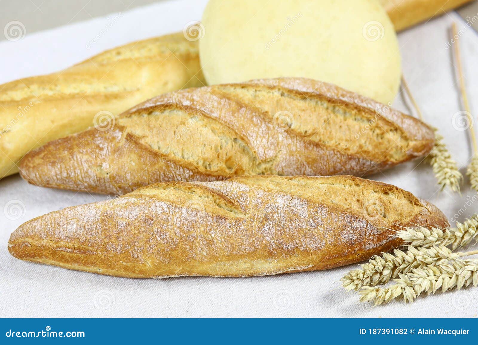 Assorted bread on a table stock photo. Image of gastronomy - 187391082