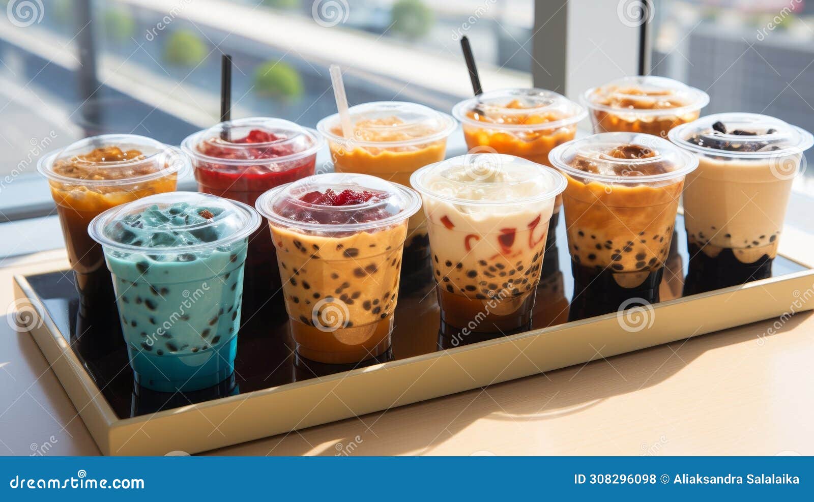 Assorted Bubble Tea Glasses Displayed on a Vibrant Table in a Trendy ...