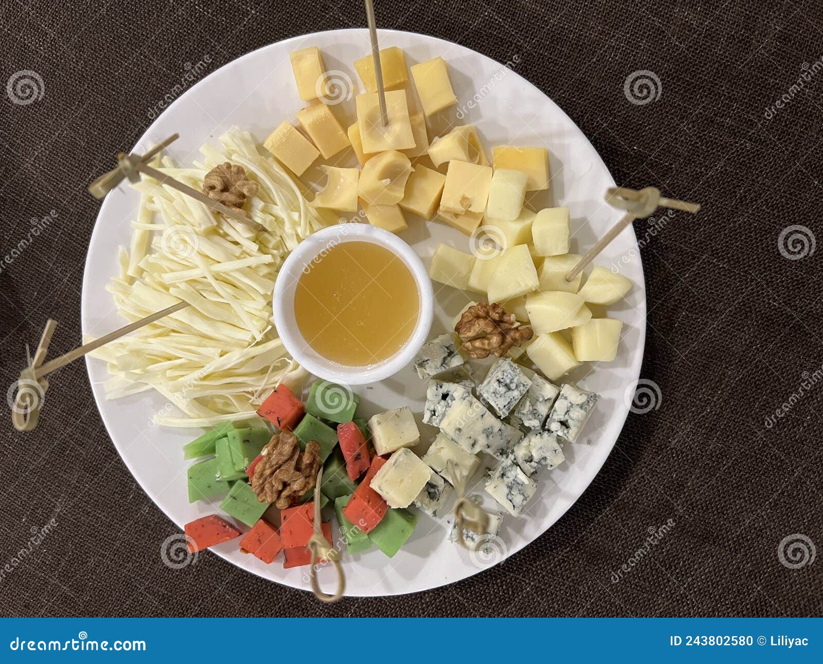 Assorted Cheese Slices. Snack on a White Plate Stock Photo - Image of ...