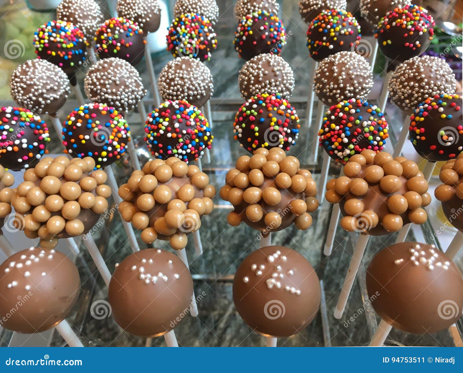 Assorted chocolate balls stock image. Image of sugar - 94753511