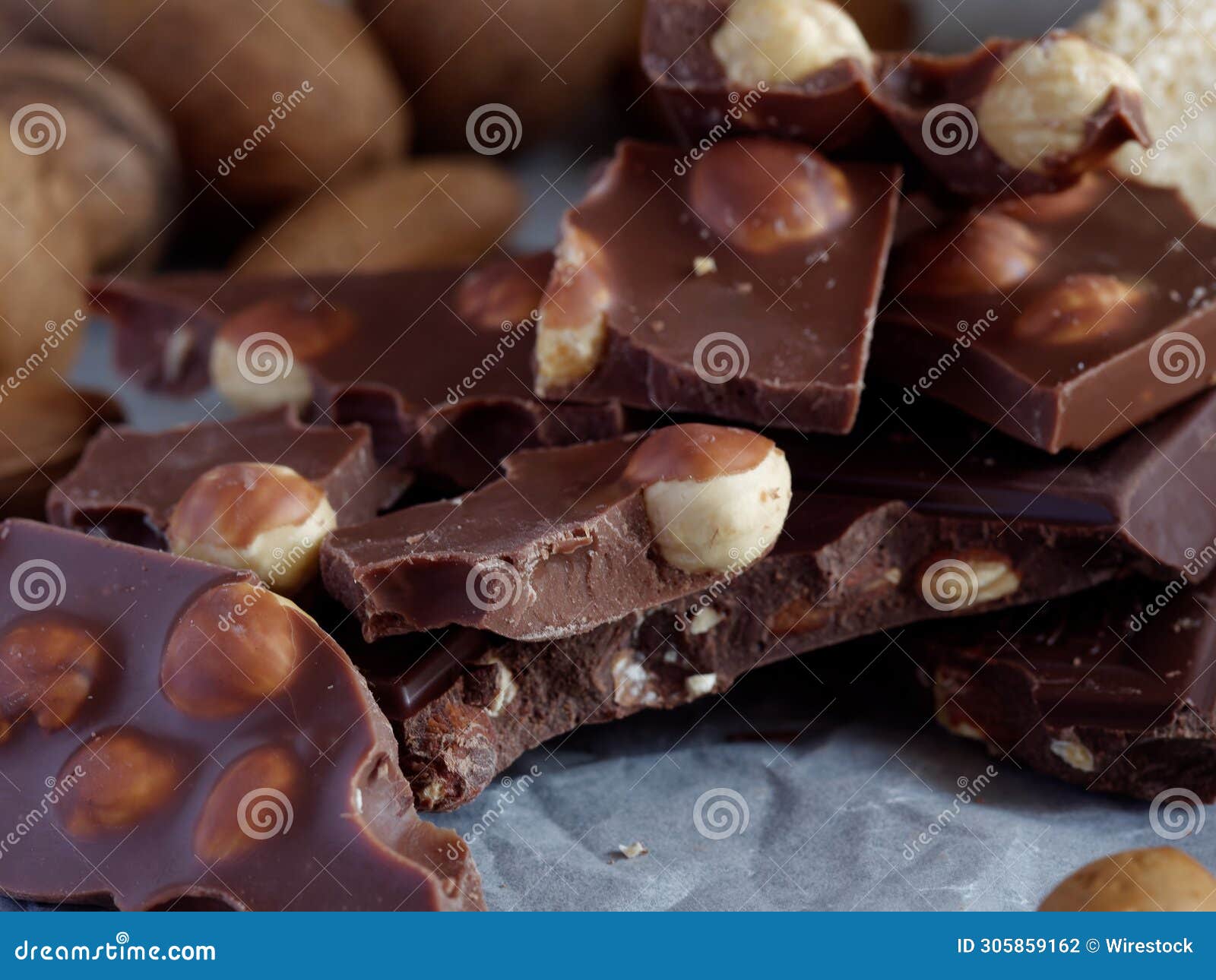 Assorted Chocolate and Nut Pieces Arranged Tastefully on a Solitary ...