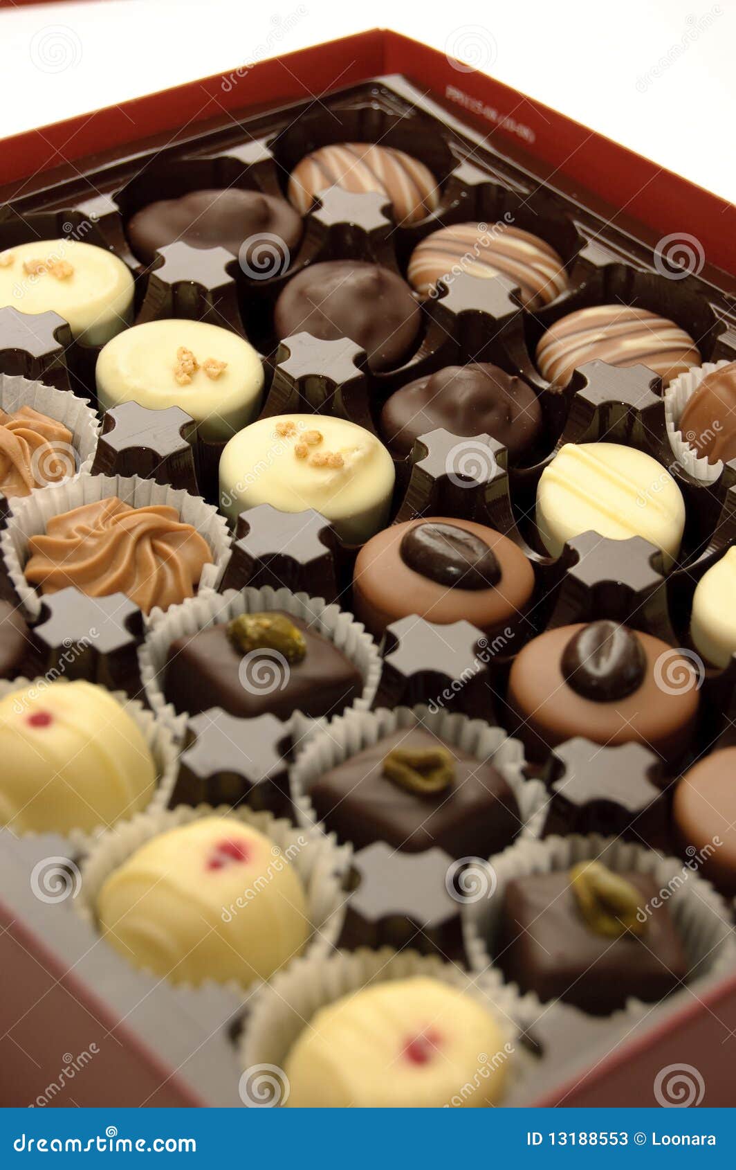 Assorted chocolates stock image. Image of eating, angle - 13188553