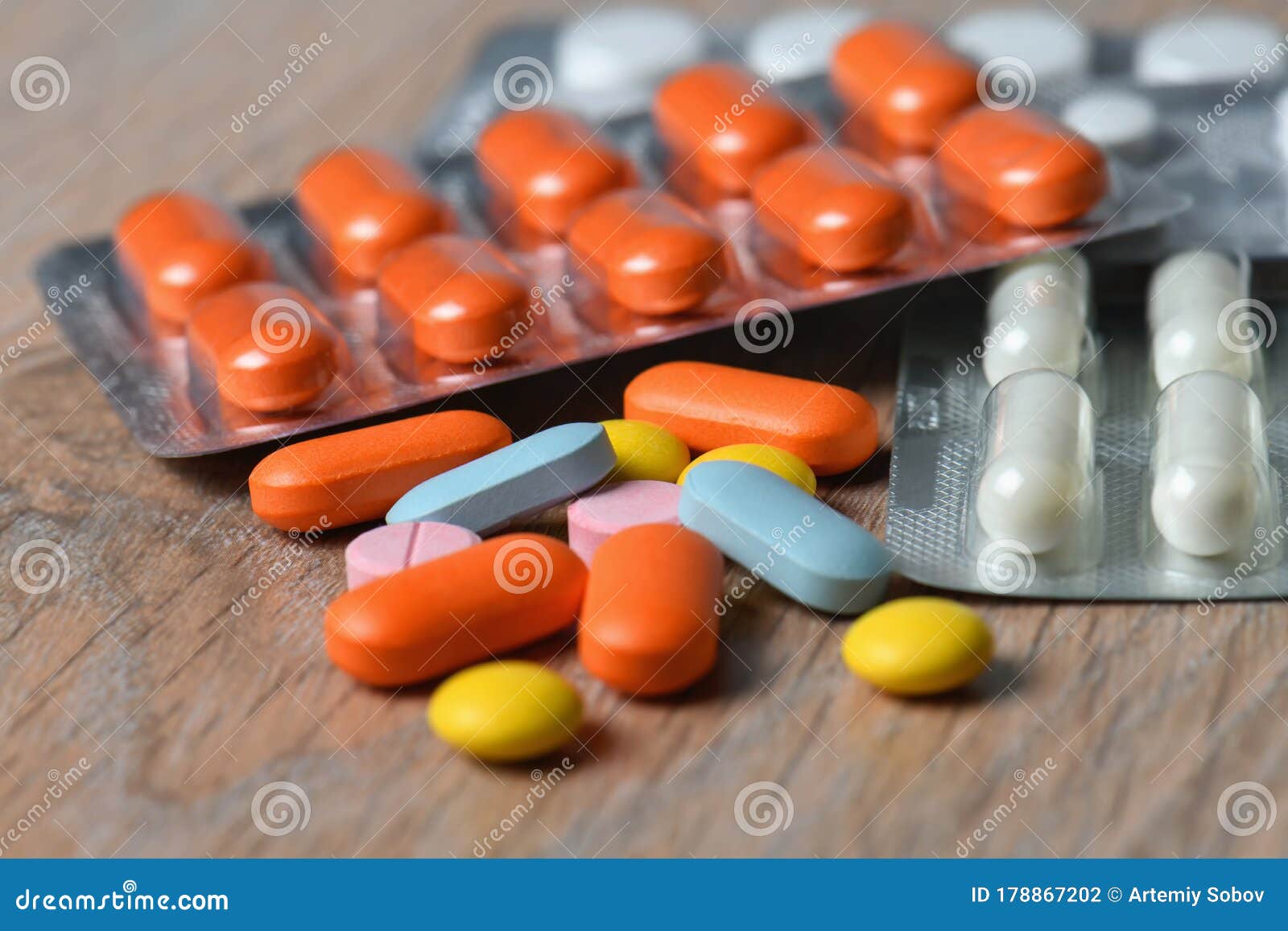 Assorted Colored Tablets and Tablet Packaging Close-up on the Table ...