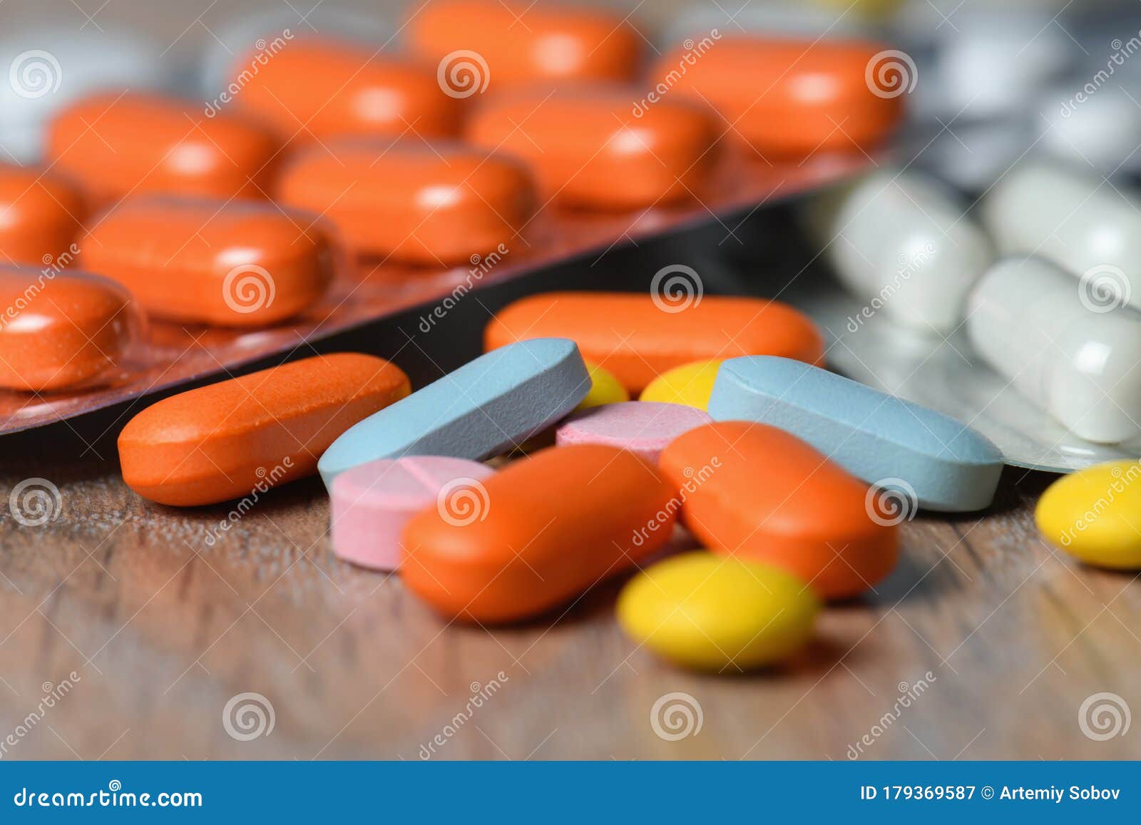 Assorted Colored Tablets and Tablet Packaging Close-up on the Table ...