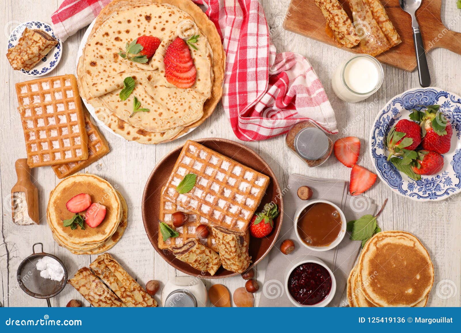 Assorted crepe and waffles stock photo. Image of breakfast - 125419136