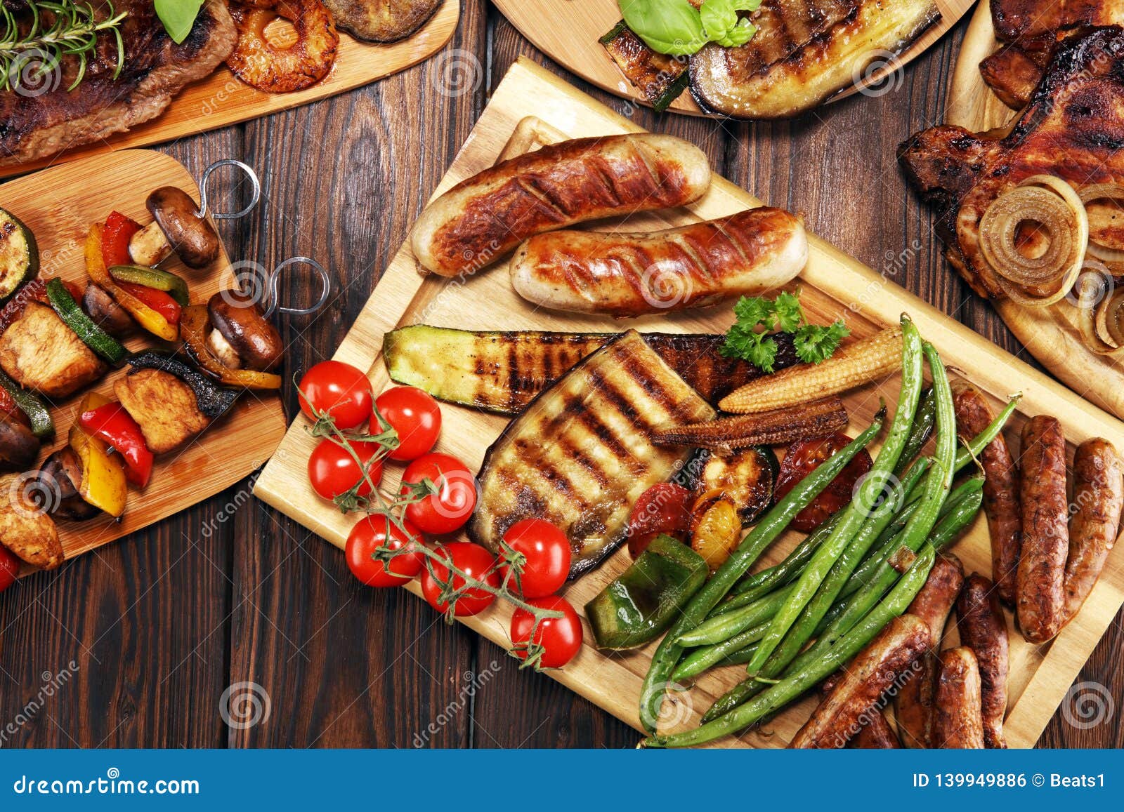 Assorted Delicious Grilled Meat with Vegetable on Rustic Table Stock ...
