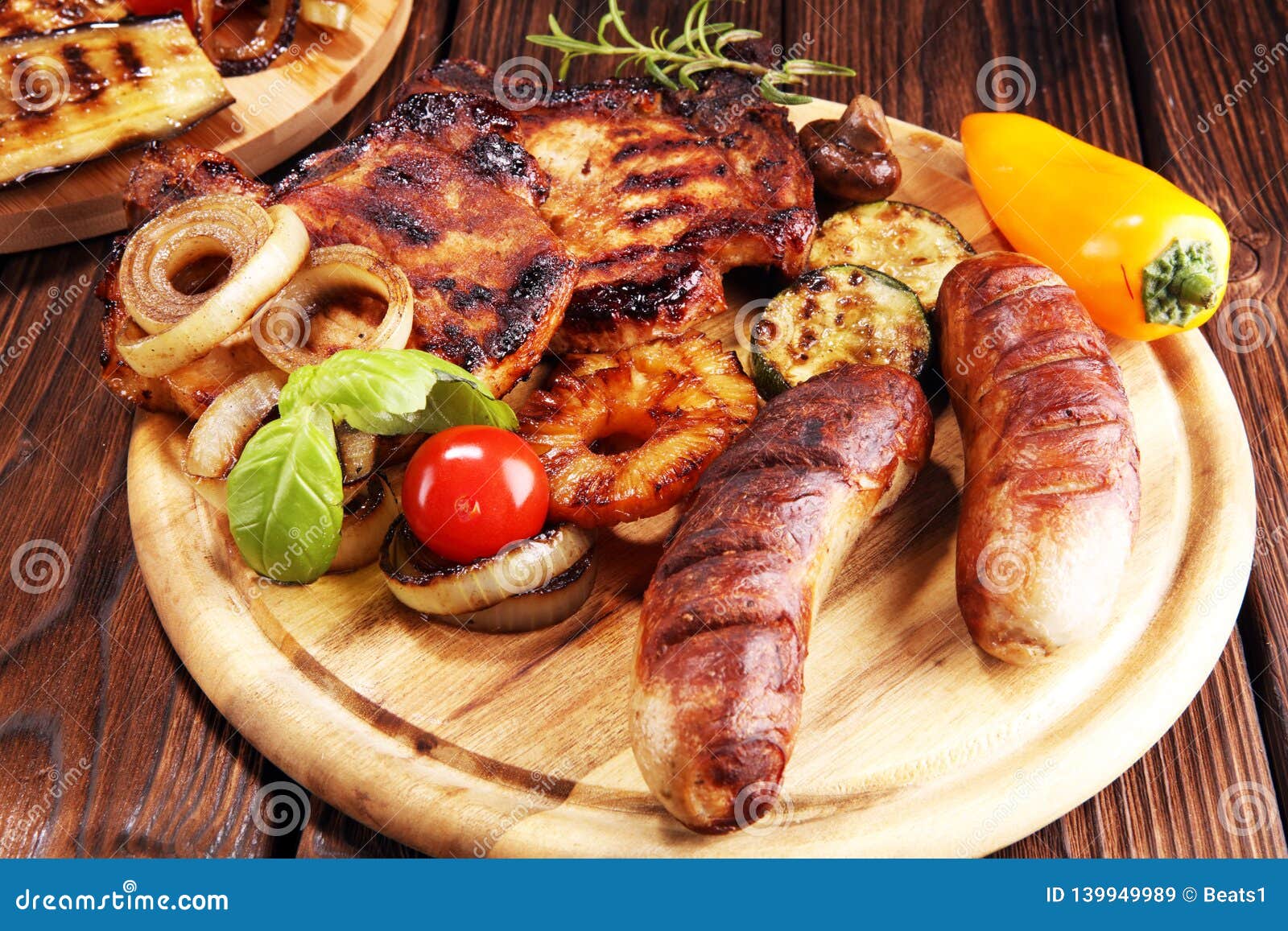 Assorted Delicious Grilled Meat with Vegetable on Rustic Table Stock ...
