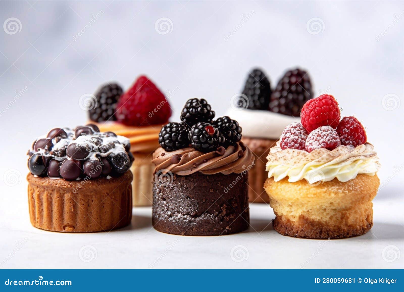 Assorted Different Mini Cakes with Cream, Chocolate and Berries Stock ...
