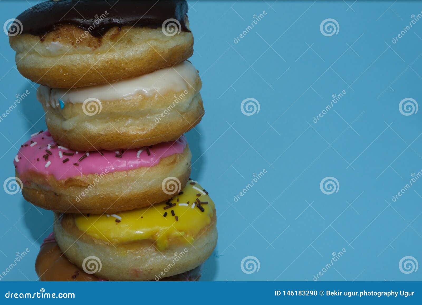 Assorted Donuts on a Blue Background Stock Photo - Image of donuts ...